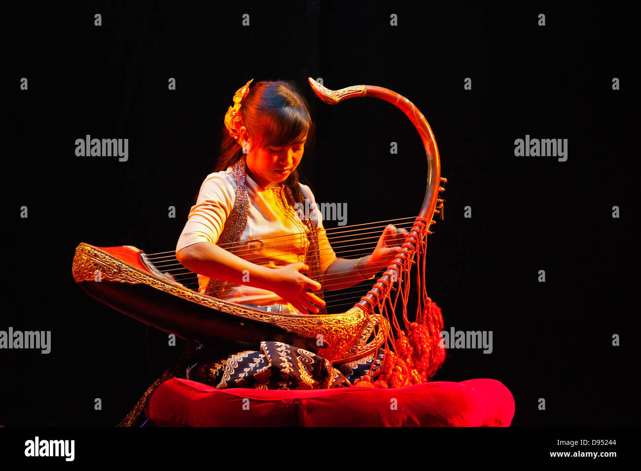 Traditional HARP MUSIC is performed at the MANDALAY MARIONETTES THEATER ...