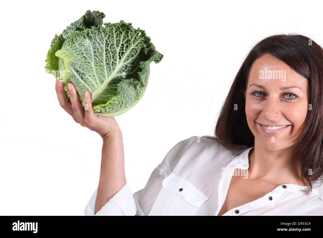 Woman holding cabbage Stock Photo - Alamy
