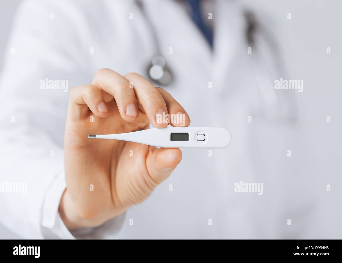 male doctor with thermometer Stock Photo - Alamy