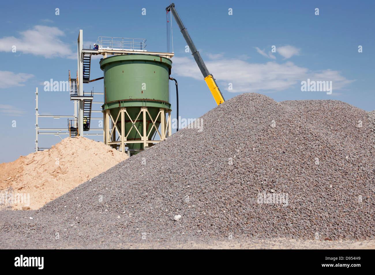 An industrial diamond mining plant is under construction with a lot of ...