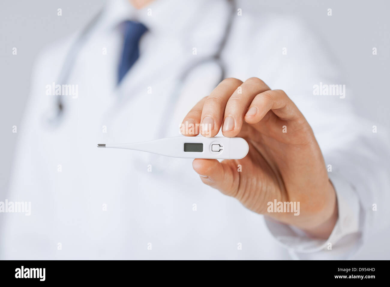 male doctor with thermometer Stock Photo - Alamy