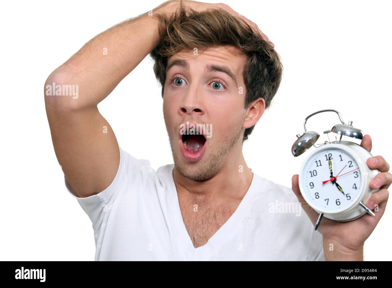 Man in a panic after sleeping in Stock Photo - Alamy