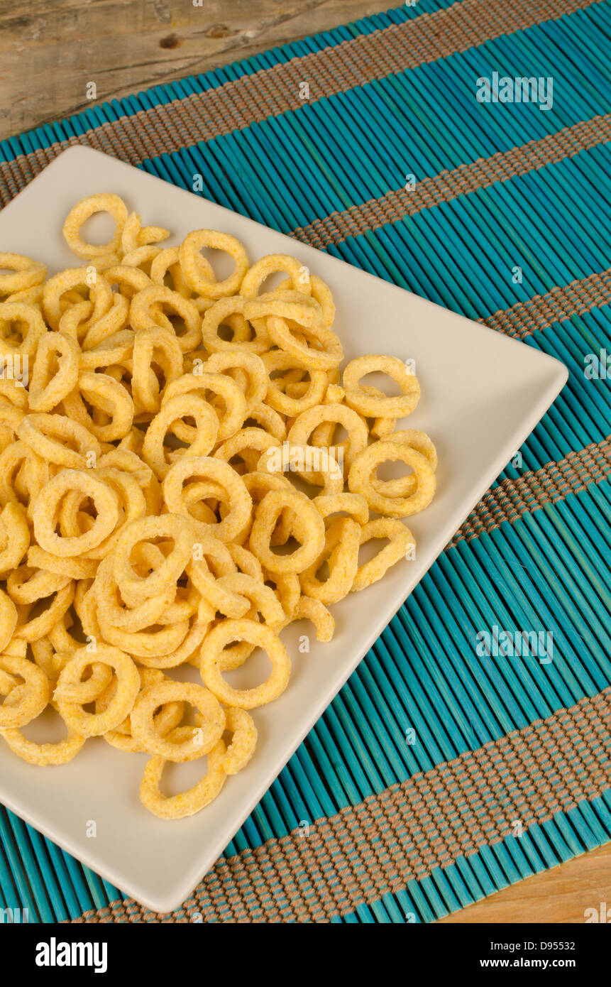 Portion of crunchy and salted corn rings Stock Photo - Alamy