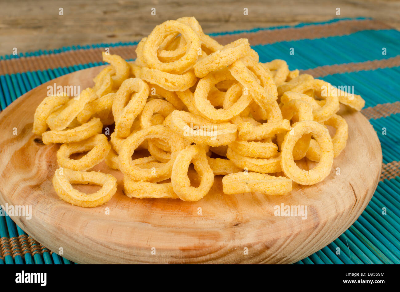 Deep fried maize rings, a crunchy snack Stock Photo - Alamy