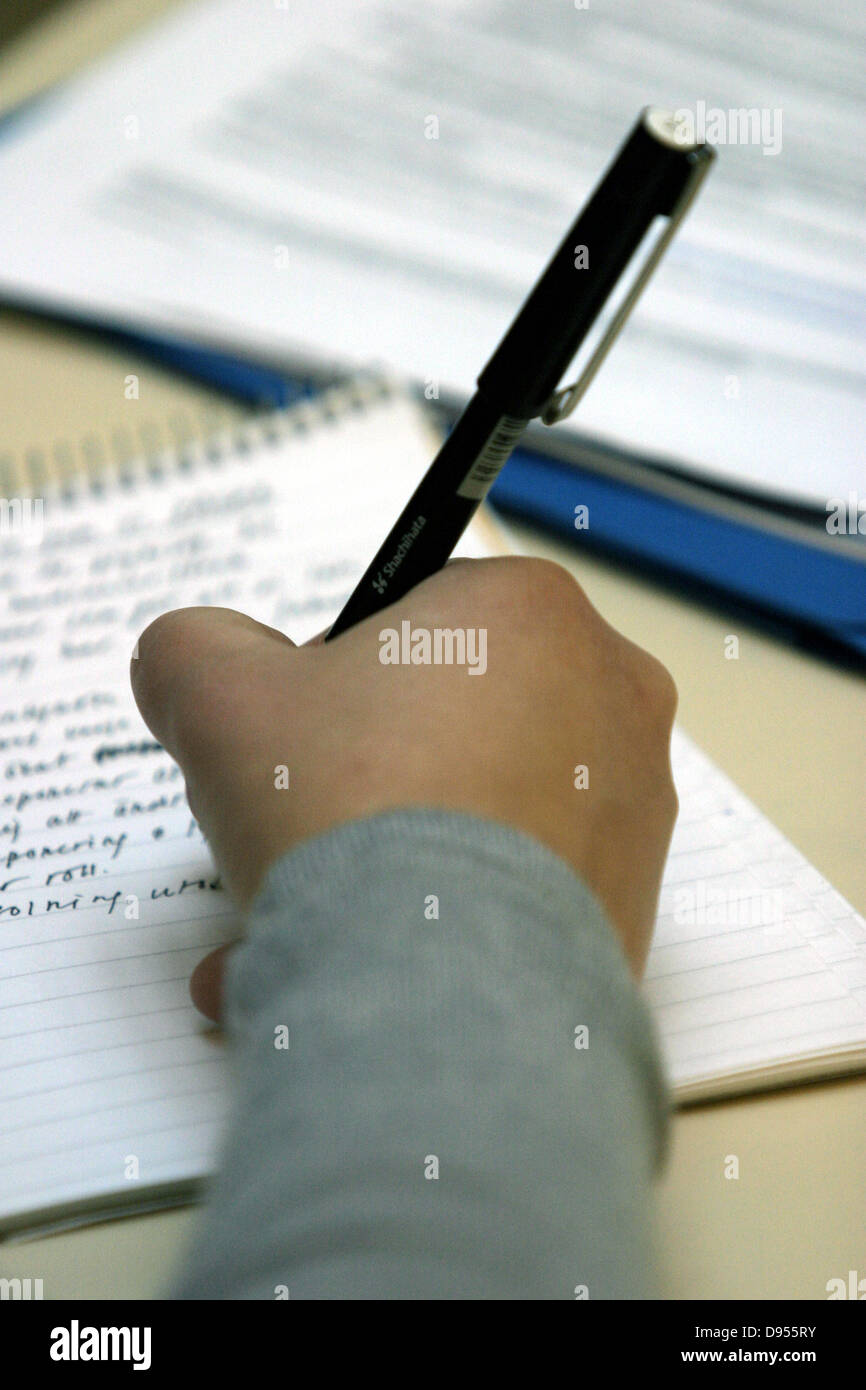 A hand taking notes Stock Photo - Alamy