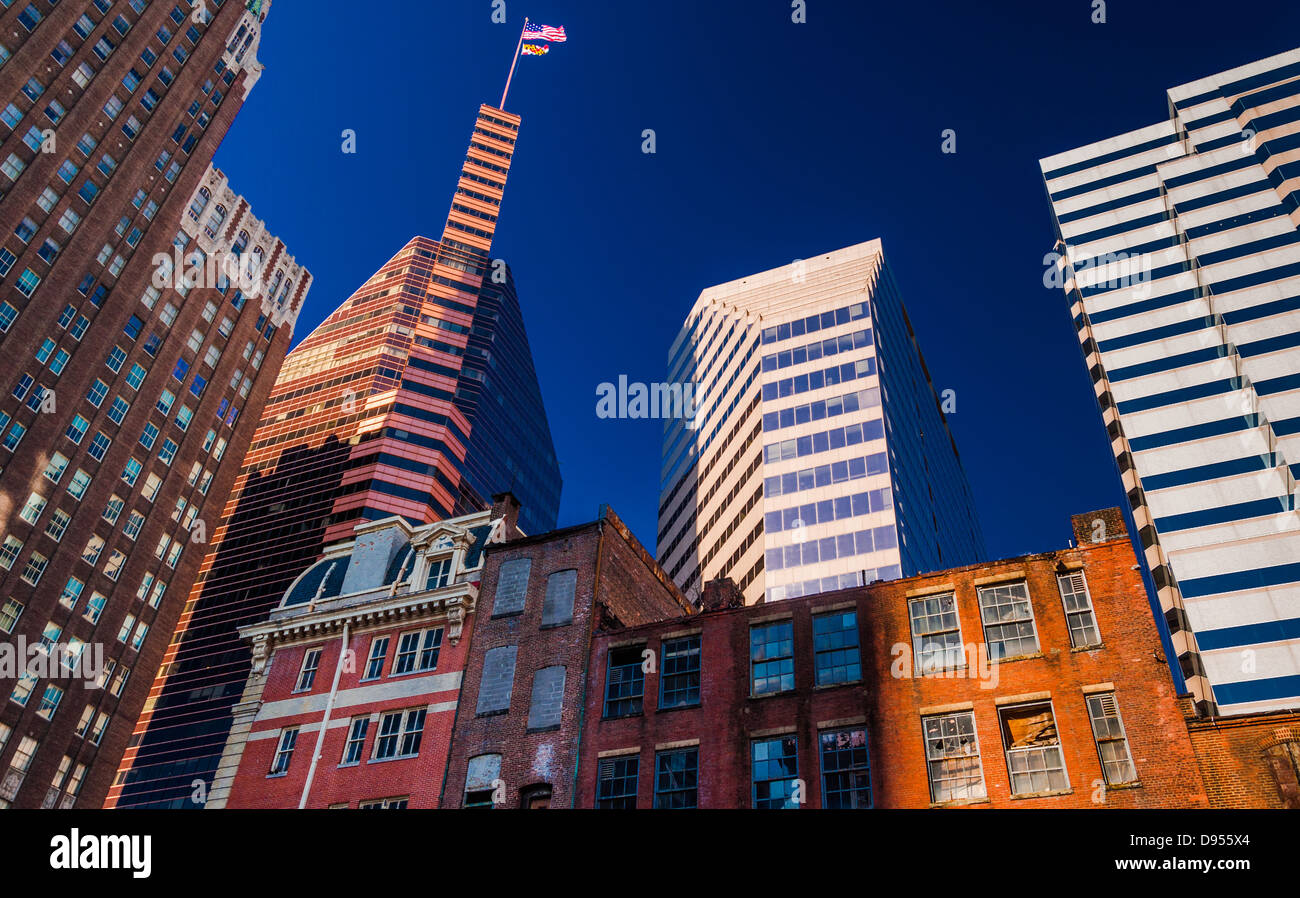 Looking up at a mix of modern and old buildings in Baltimore, Maryland ...
