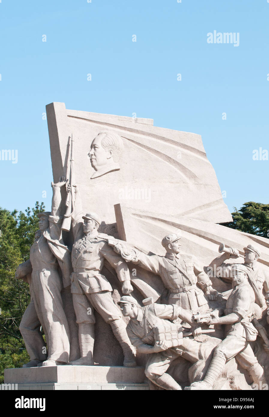 Stone revolutionary monument in front of Mausoleum of Mao Zedong at ...