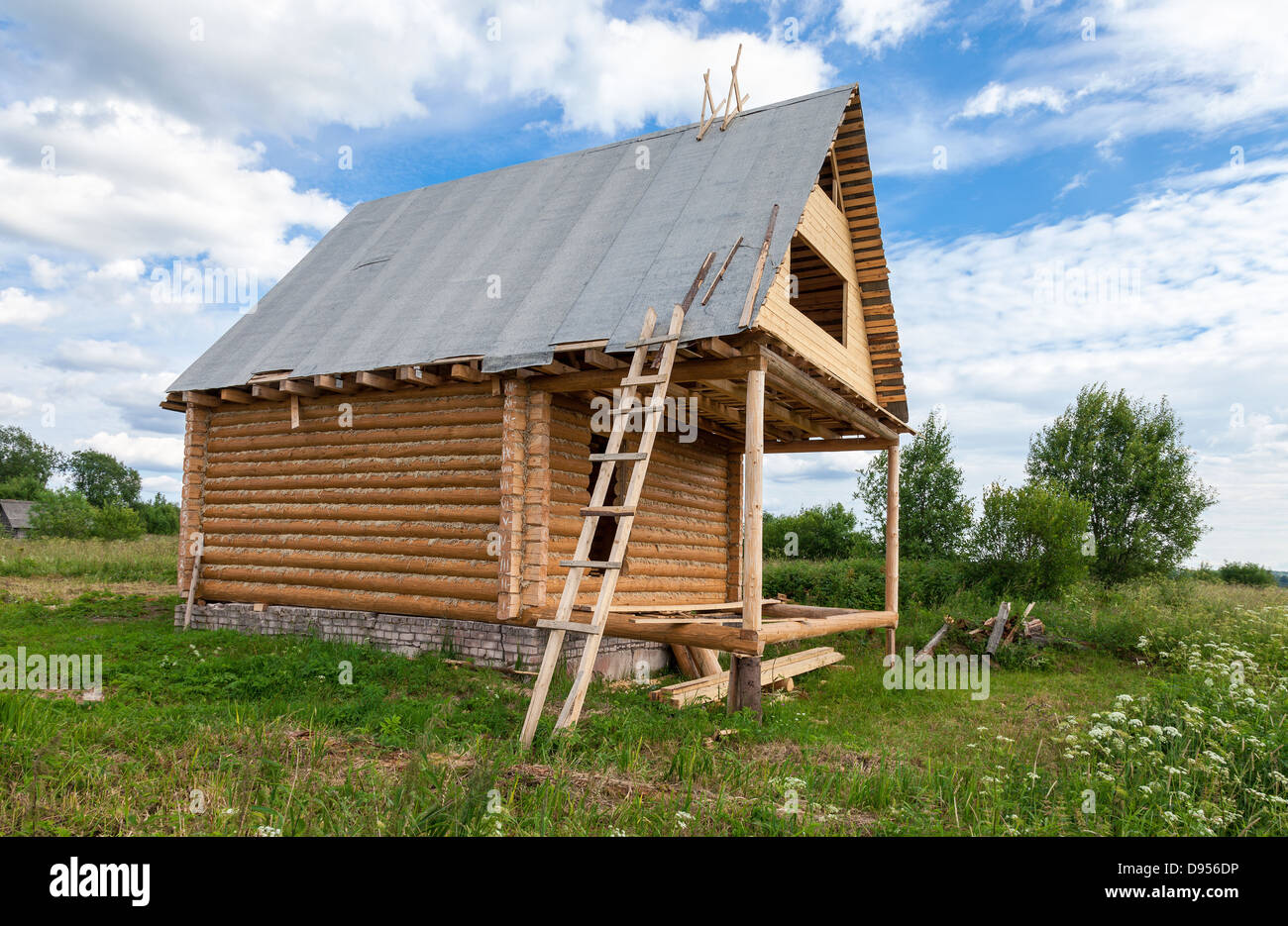 Wooden house under construction Stock Photo - Alamy