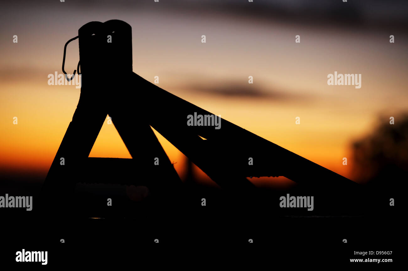 Silhouette Photo of a farming implement at sunrise.It makes a stunning ...