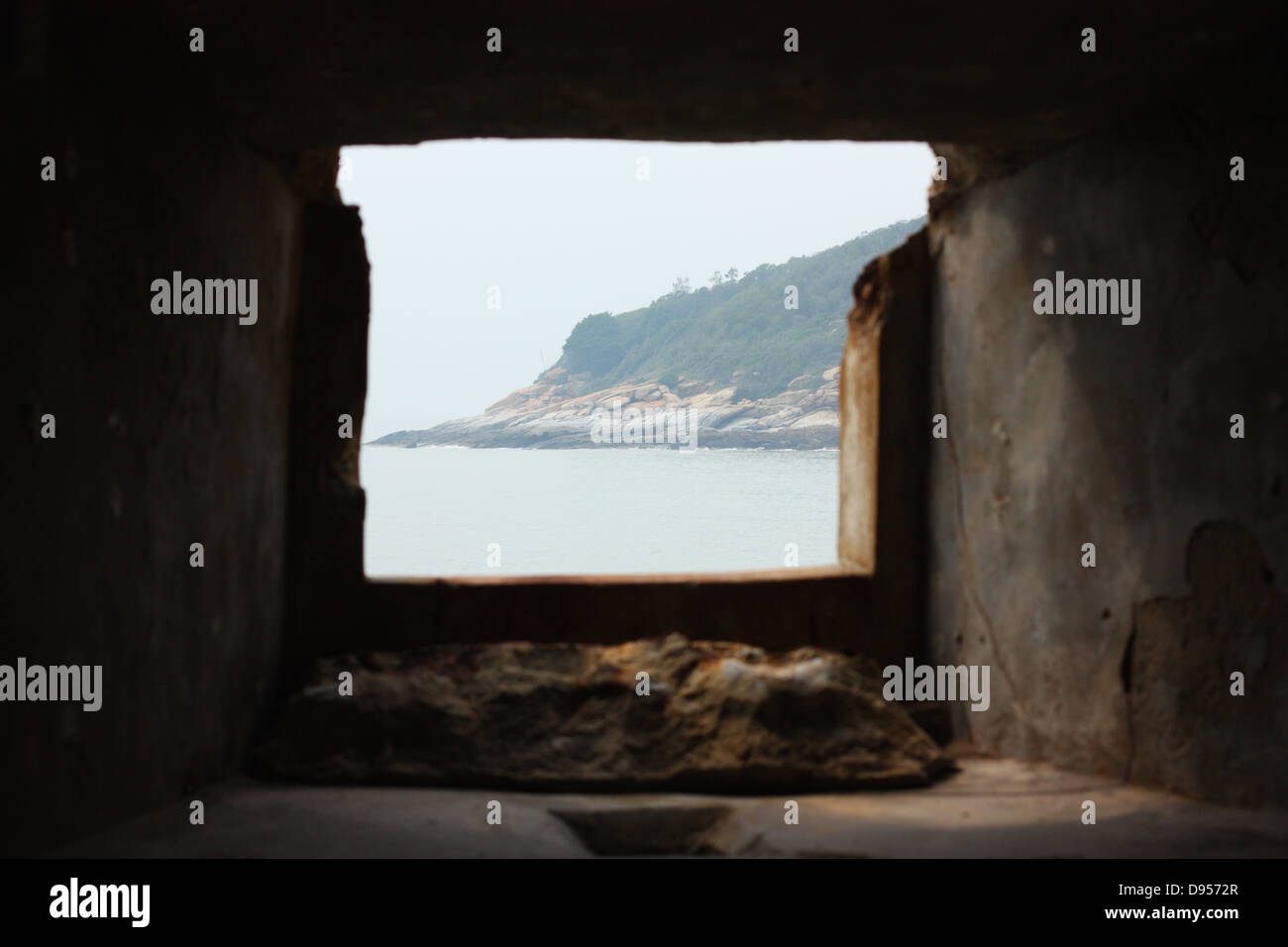 Looking out of an old military bunker at an entrance to Jhaishan Tunnel ...