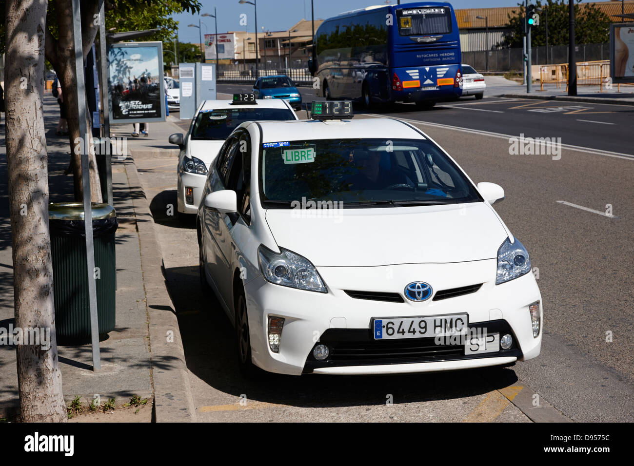 row of hybrid vehicle taxi cabs on a rank in valencia spain Stock Photo ...