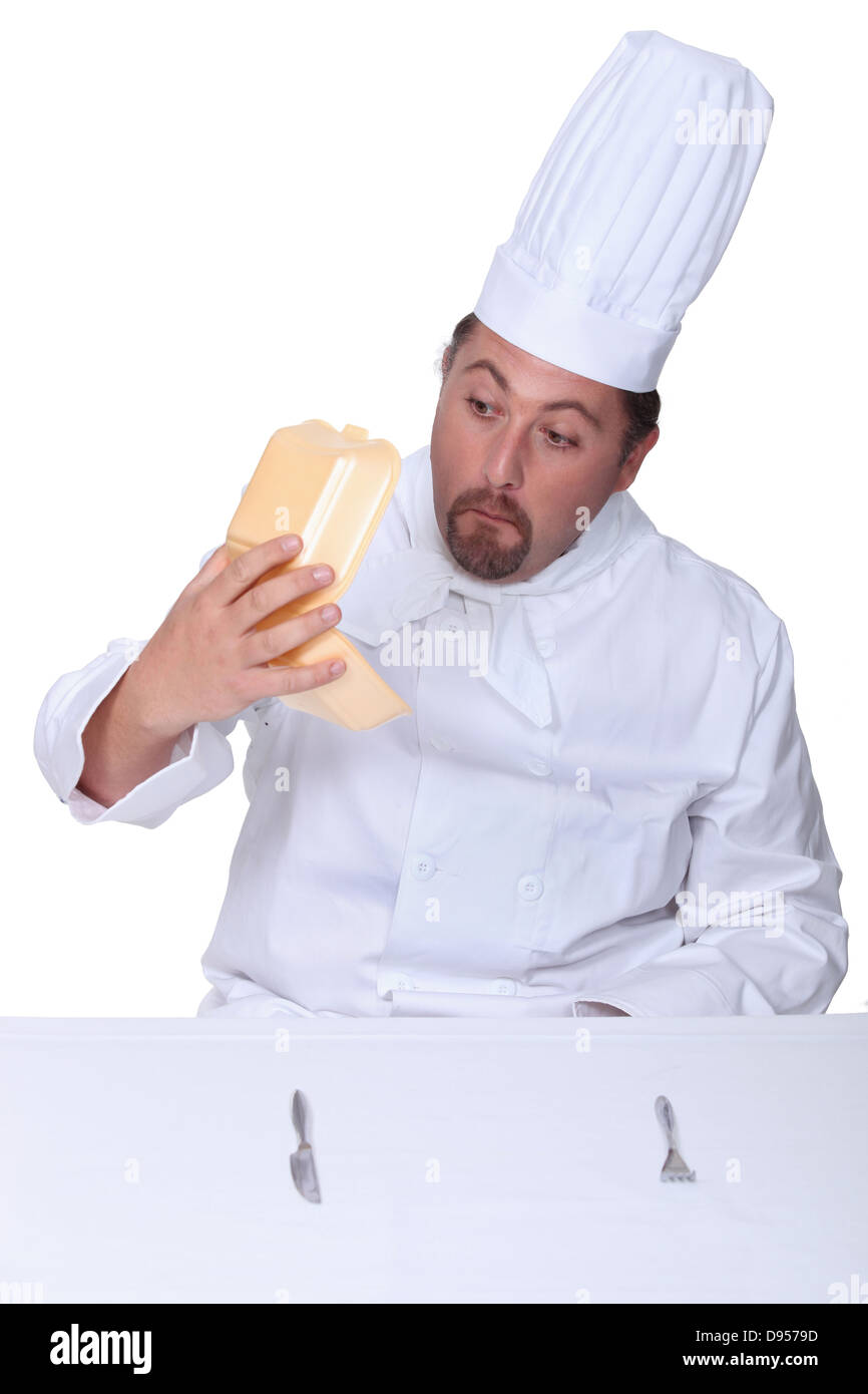 Chef looking into empty burger box Stock Photo - Alamy