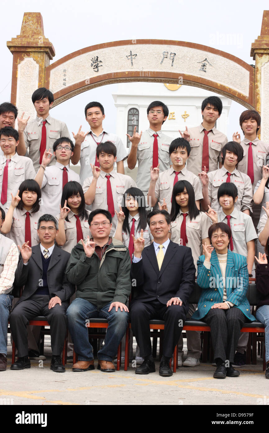 Middle school students pose for a class photo with administrators at ...