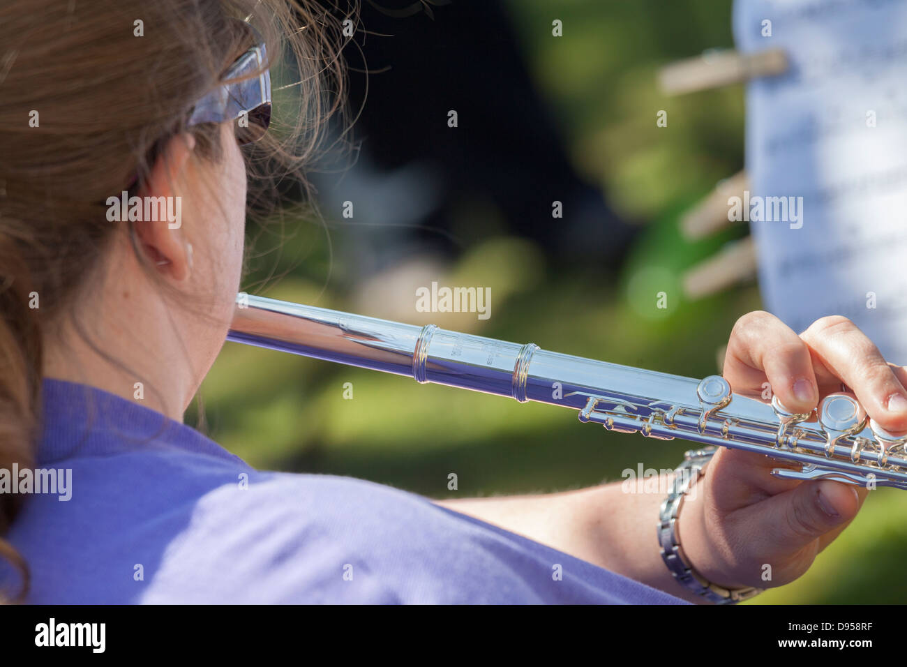 Female playing flute hi-res stock photography and images - Alamy