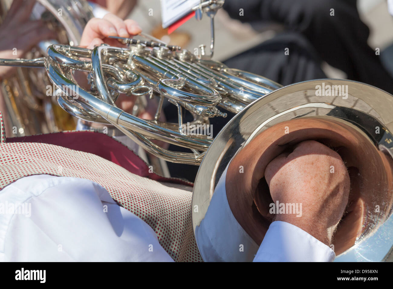 close of male playing french horn and hand muting Stock Photo - Alamy