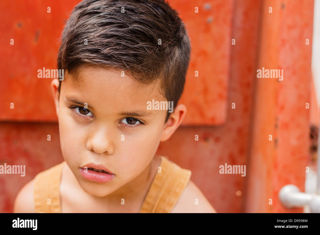 Angry upset little boy Stock Photo - Alamy