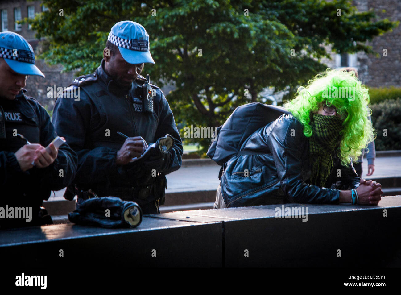 London, UK. 11th June, 2013. Police officers catch up with their notes ...
