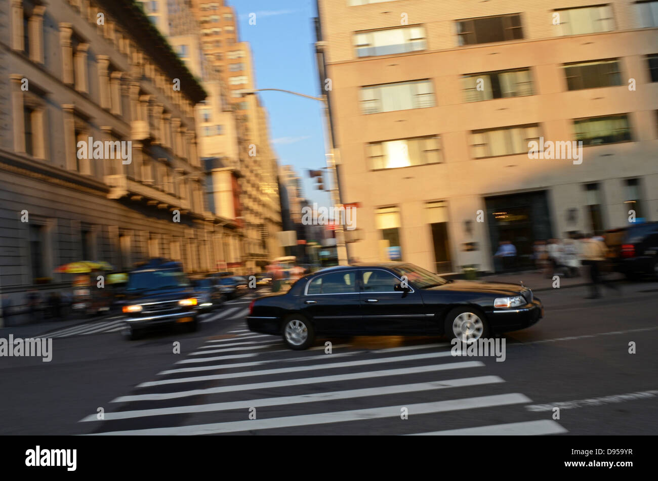 Sedan in motion in Manhattan, New York City Stock Photo - Alamy