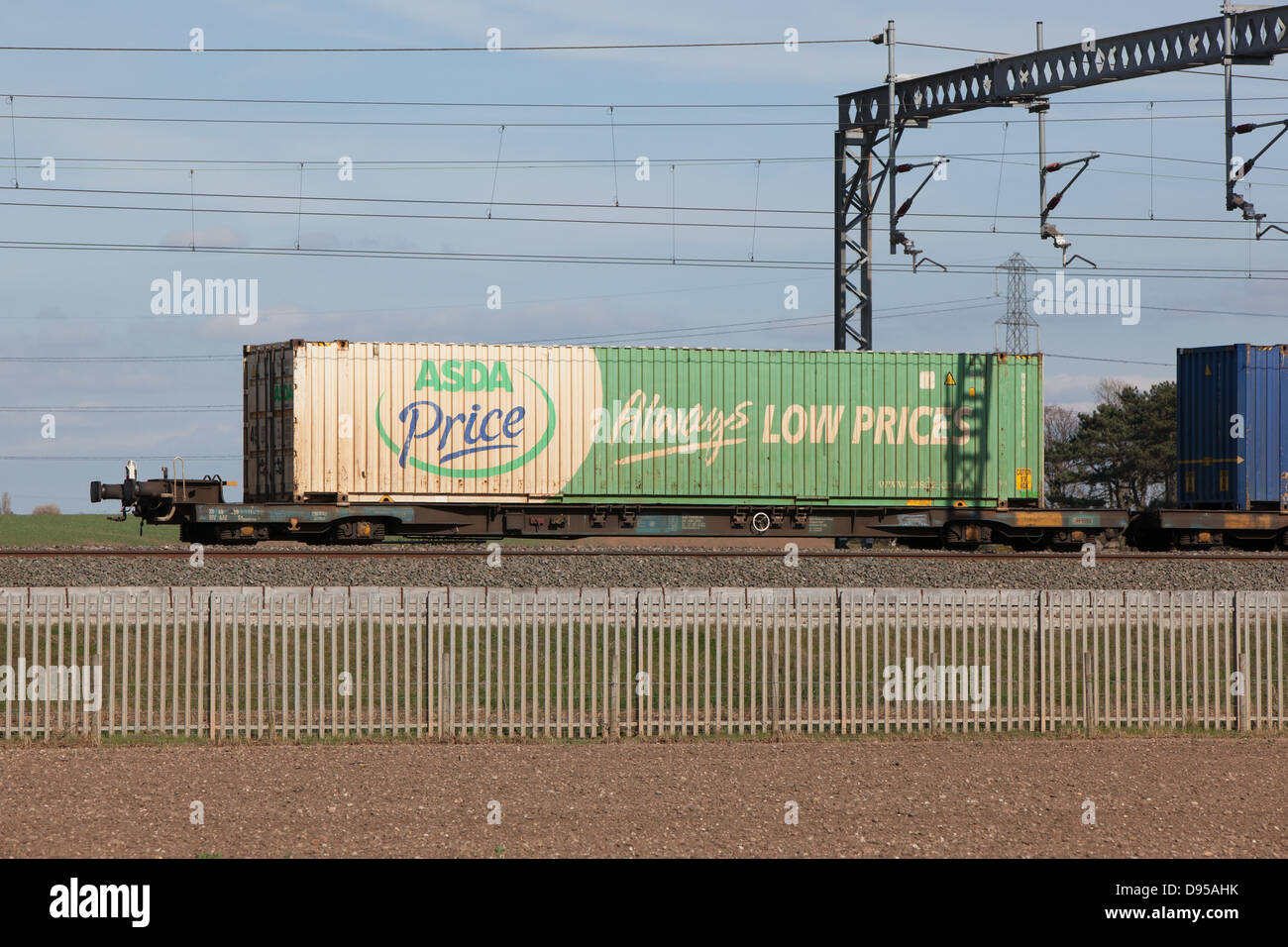 A shipping container on the railway branded for Asda supermarkets Stock ...