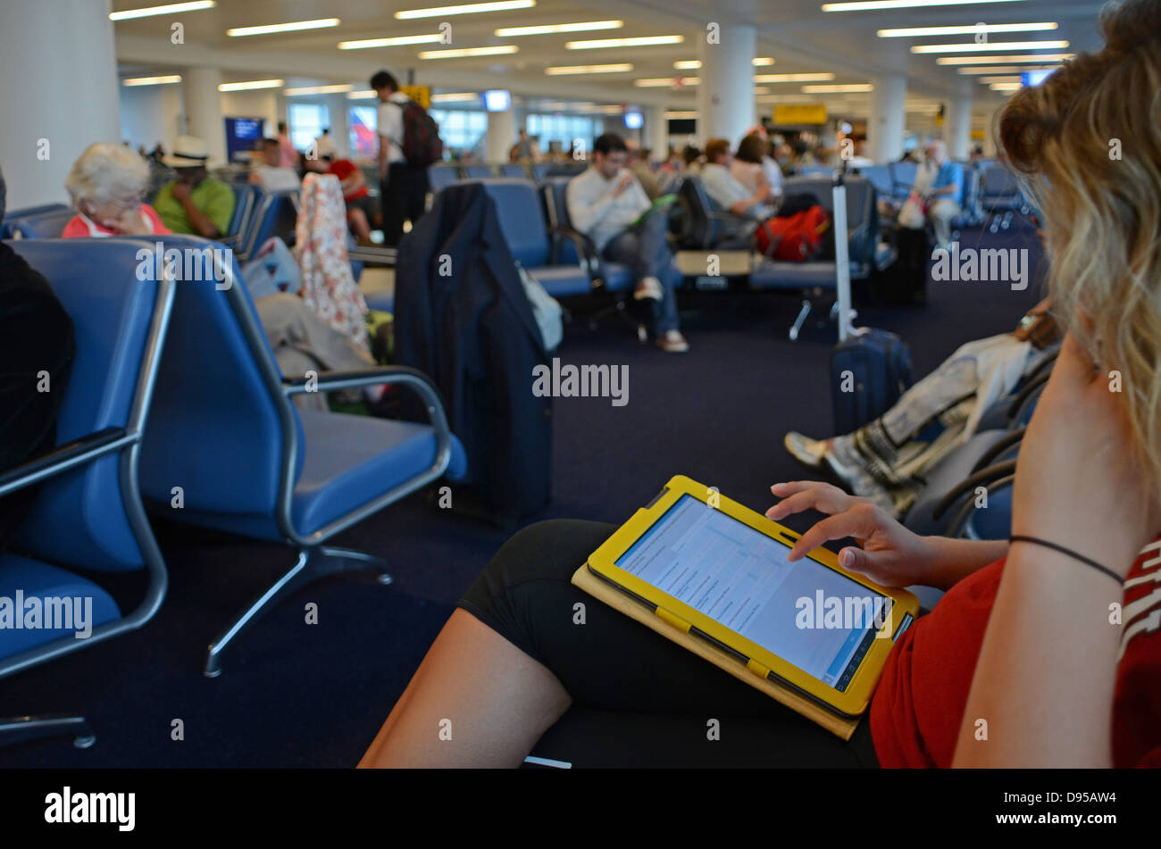 People waiting in gate for departure, Terminal 4 of JFK airport, New ...