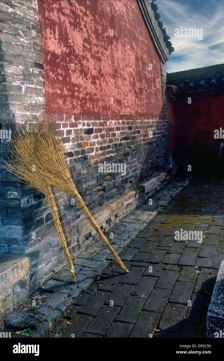 A Chinese village scene with street cleaning brooms,near Beijing China ...