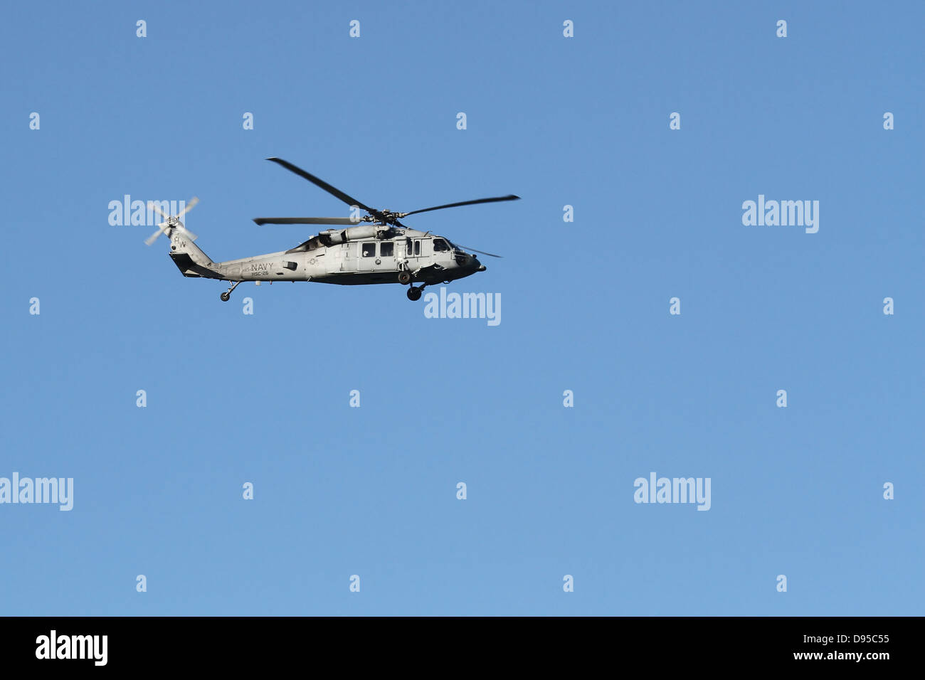 A US Navy HH-60H Seahawk flying from left to right Stock Photo - Alamy