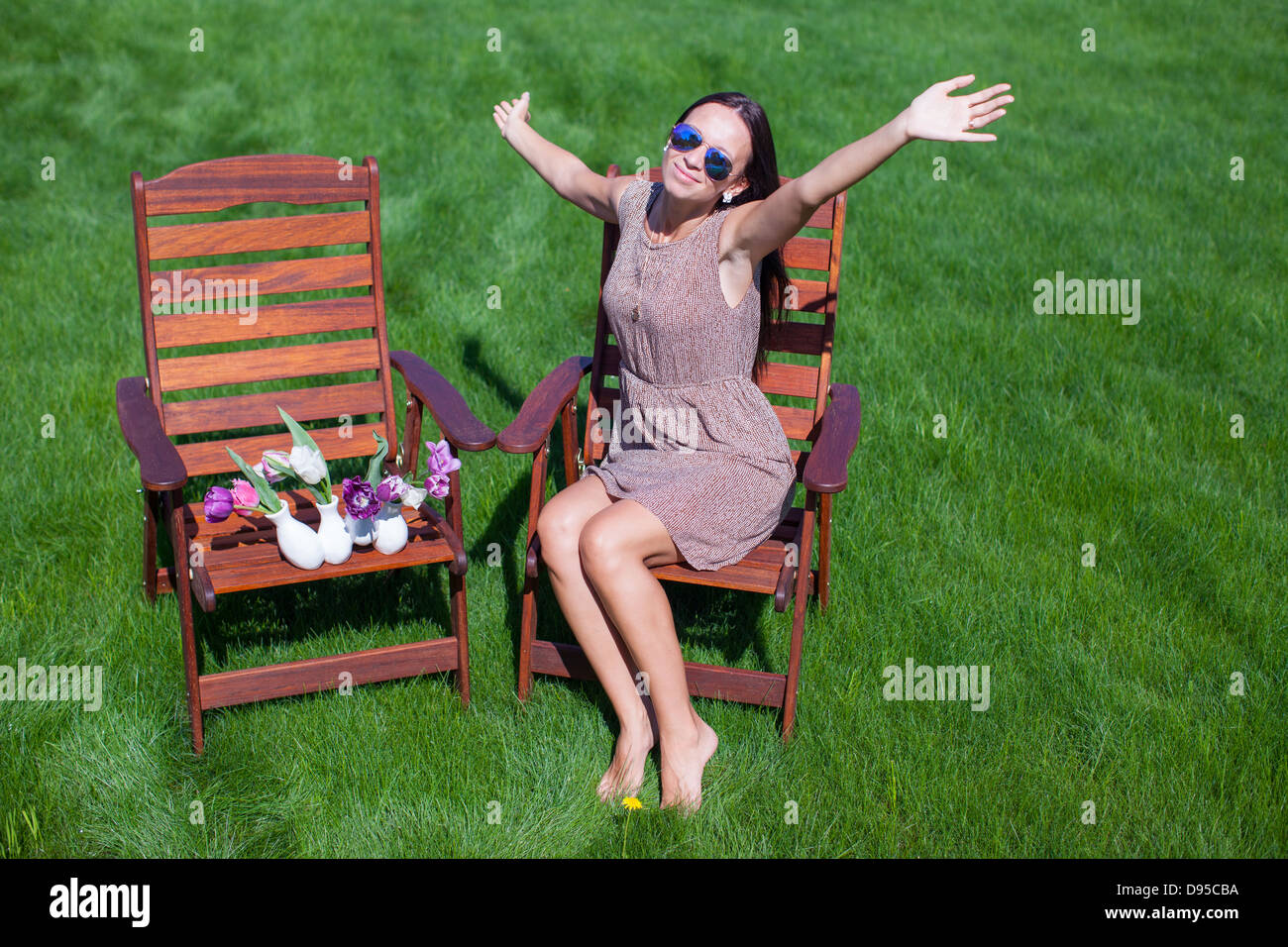 young beautiful woman resting on natural background Stock Photo - Alamy