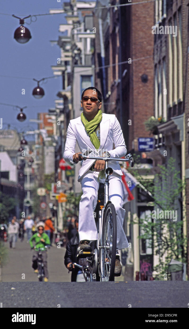 Young man on a bike. Jordaan, Amsterdam, The Netherlands Stock Photo ...
