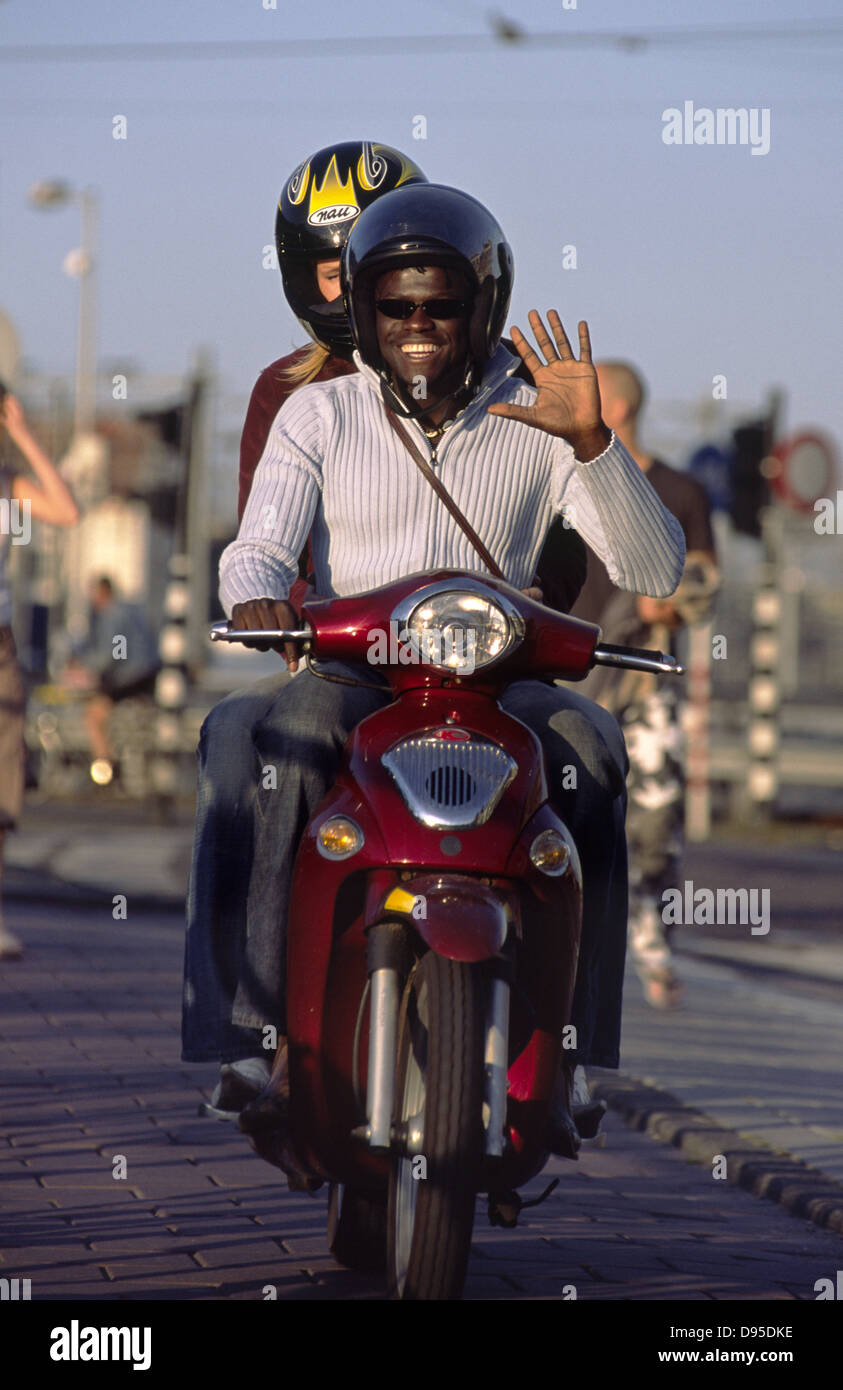 Scooter riders hi-res stock photography and images - Alamy