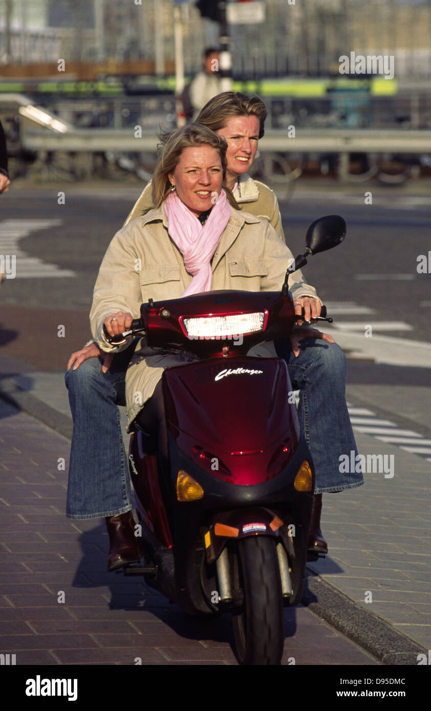 Scooter Riders. Amsterdam, The Netherlands Stock Photo - Alamy