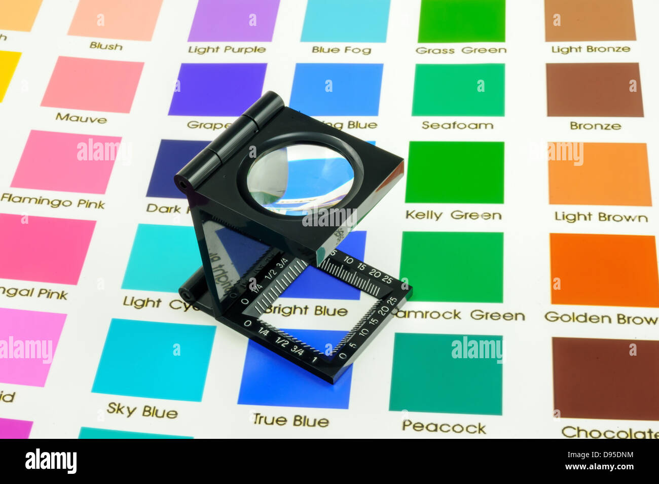 Magnifier loupe color management on color chart Stock Photo - Alamy
