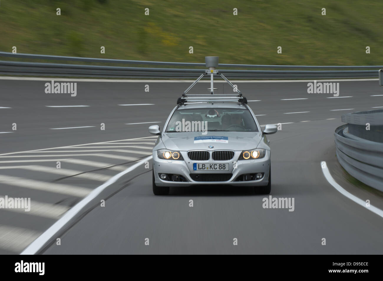 A car equipped with technology for automated driving by Bosch drives on ...
