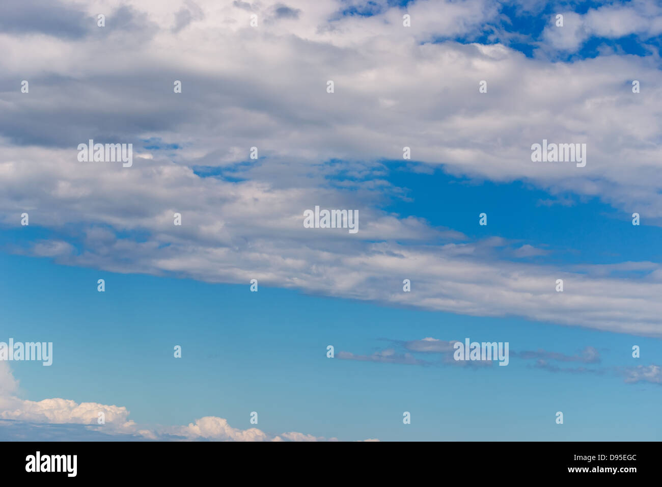 stratus clouds on a blue sky Stock Photo - Alamy