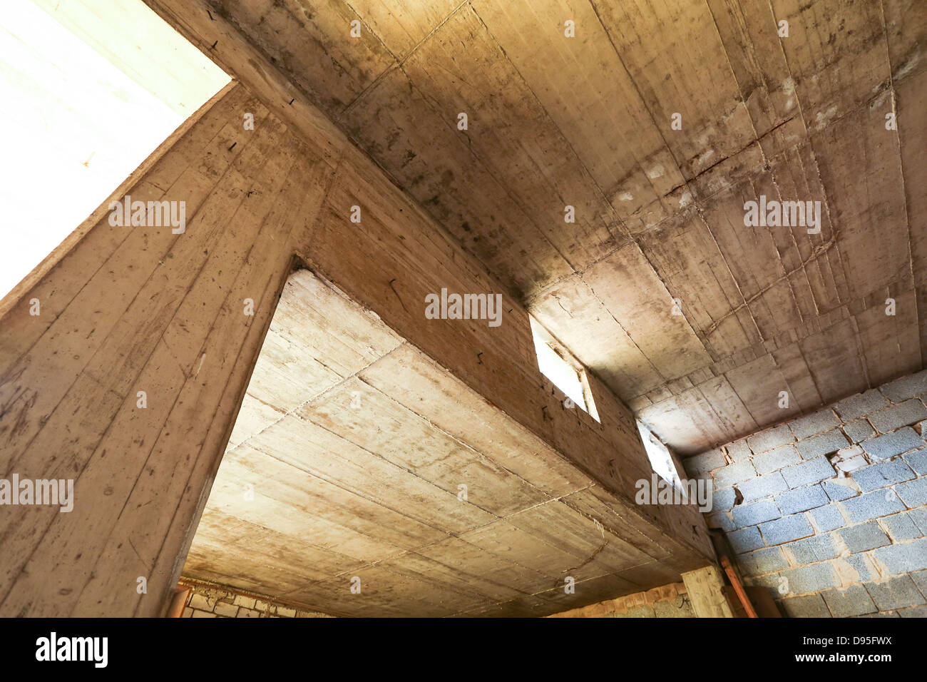 Interior of a concrete garage building Stock Photo - Alamy