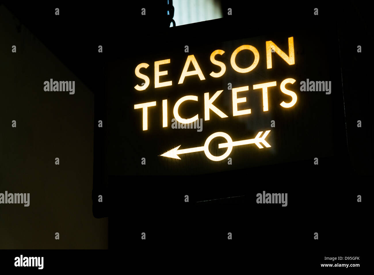 Old illuminated railway sign giving directions for the purchase of ...