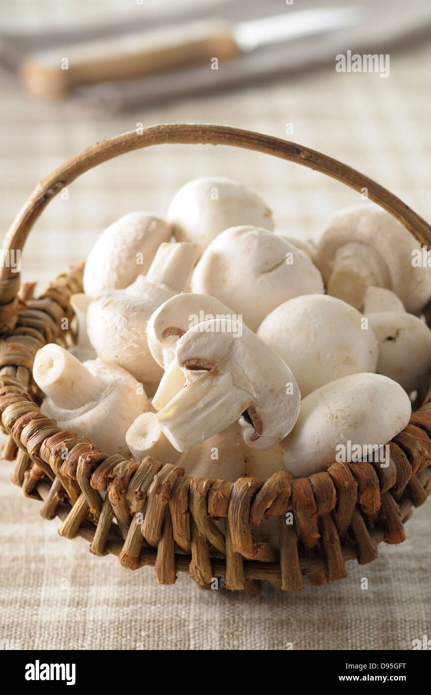 Close-up of Basket with Button Mushrooms Stock Photo - Alamy