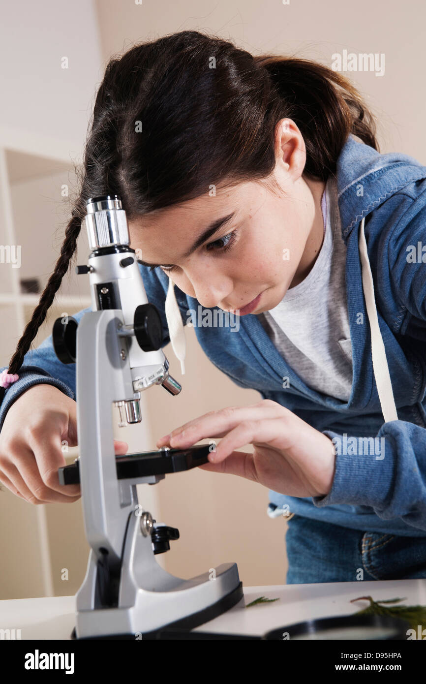 Girl using Microscope, Mannheim, Baden-Wurttemberg, Germany Stock Photo ...