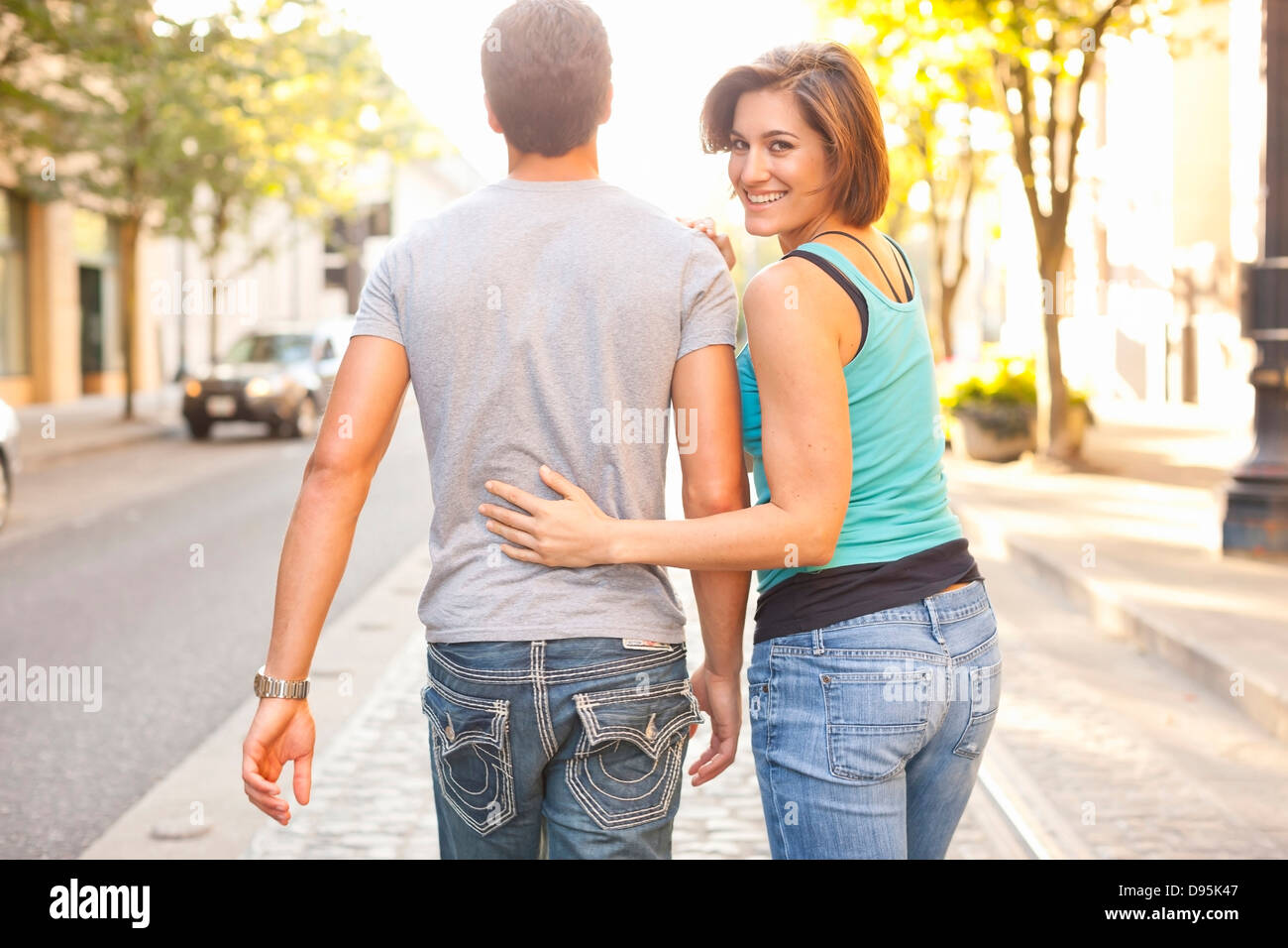 Couple Walking Outdoors, Woman Looking over Shoulder, Portland, Oregon ...