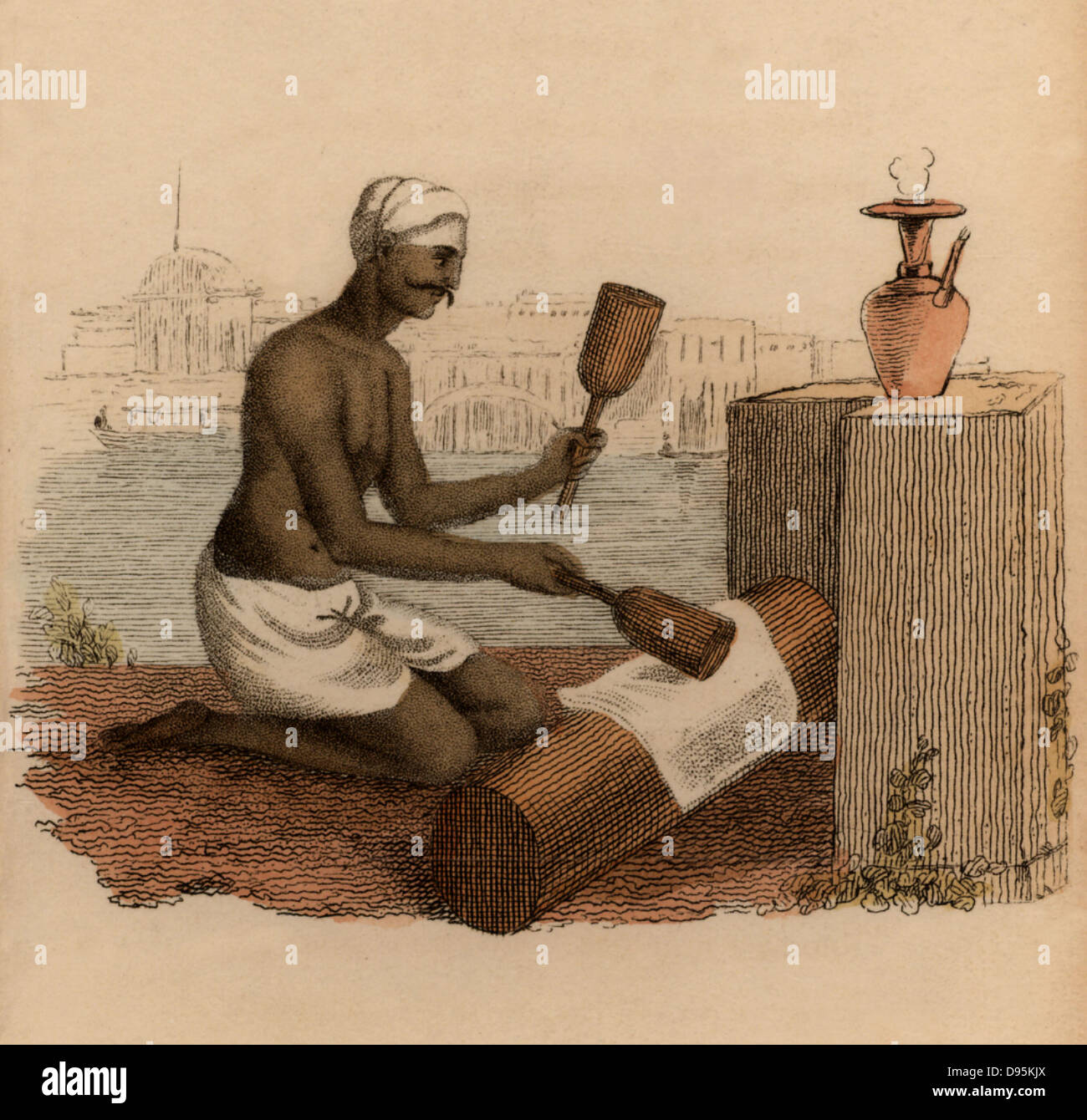 Beating cotton cloth with wooden mallets to give it greater strength ...