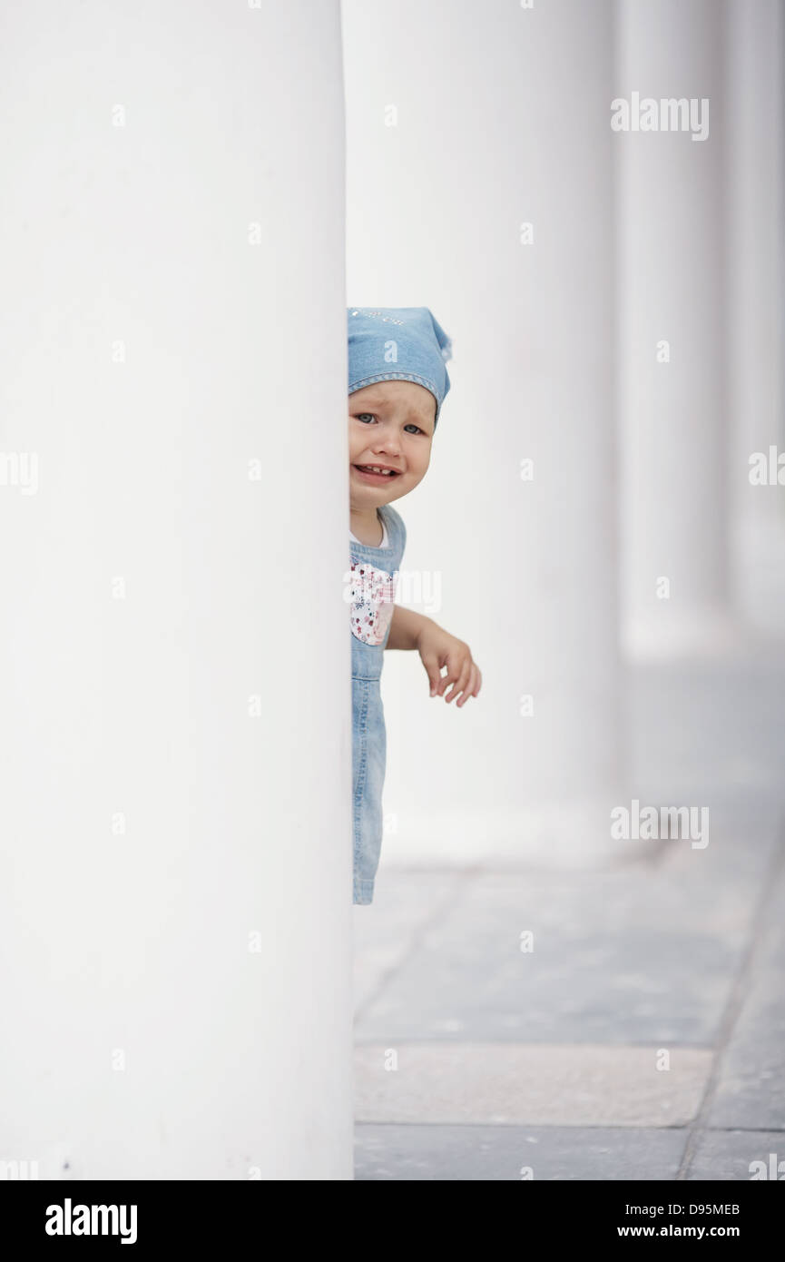 little girl hiding in white columns Stock Photo - Alamy little girl hiding in white columns Stock Photo - Alamy