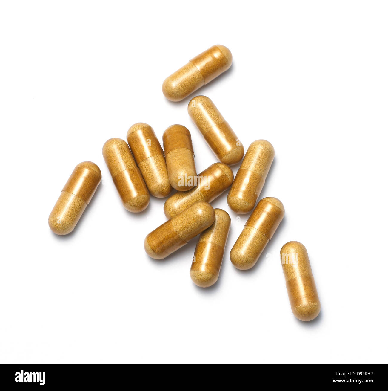brown capsules cut out onto a white background Stock Photo - Alamy