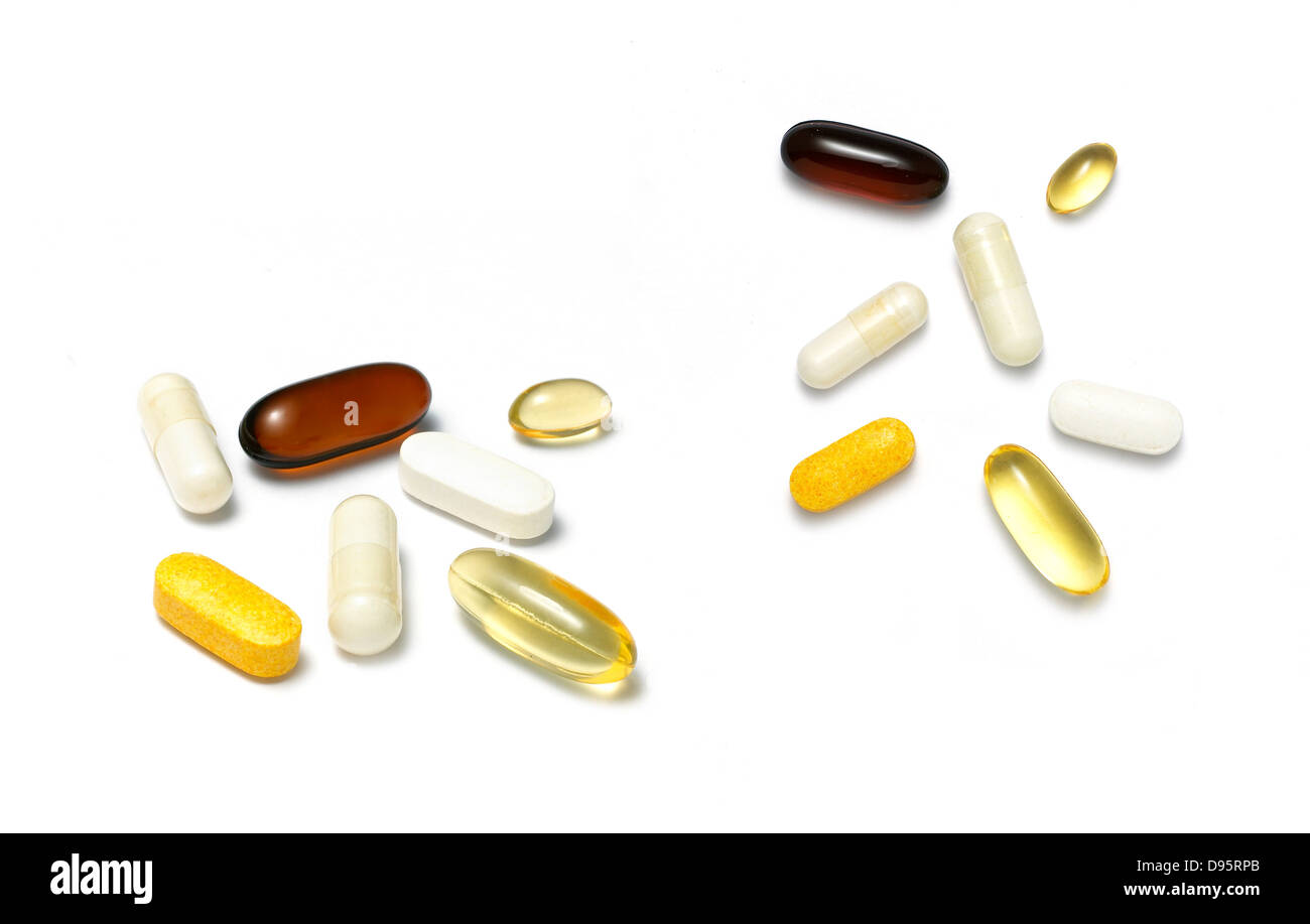 mixed pills and capsules cut out onto a white background Stock Photo ...