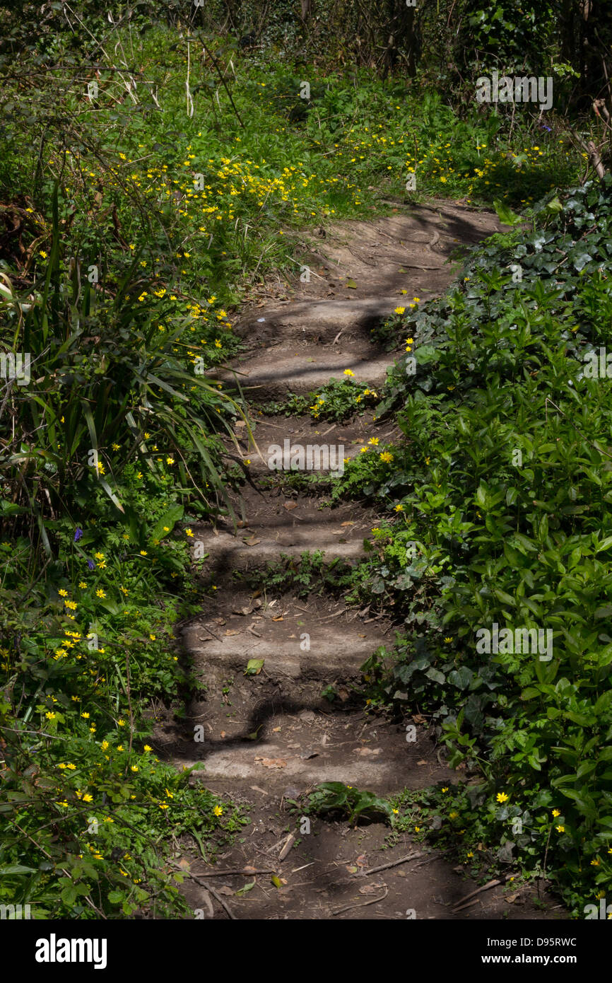 Stone footsteps on the South Wales Coast Path near Llantwit Major Stock ...