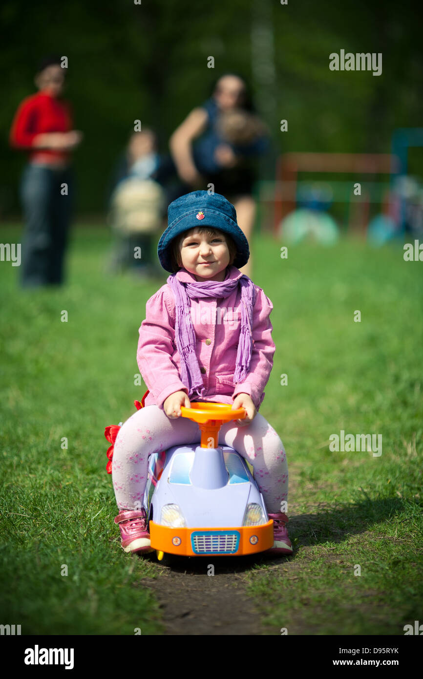 little girl with car Stock Photo - Alamy