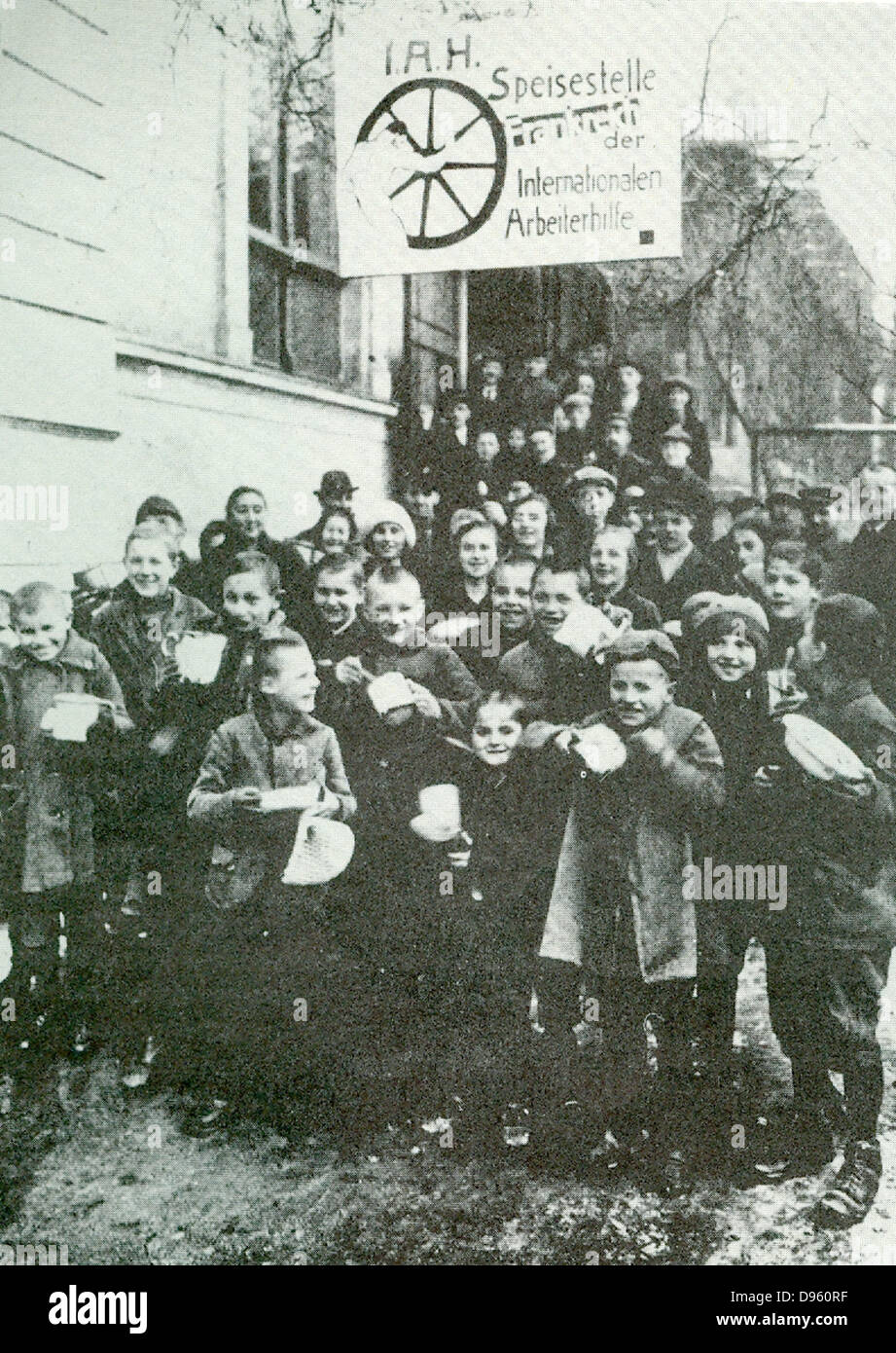 German children receive soup at a communal kitchen during the poverty ...