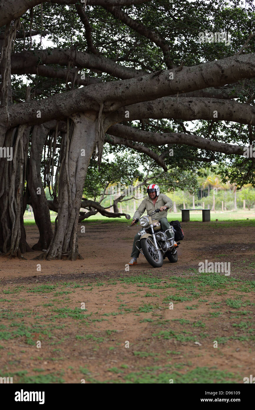 European man driving a Royal Enfield Stock Photo - Alamy