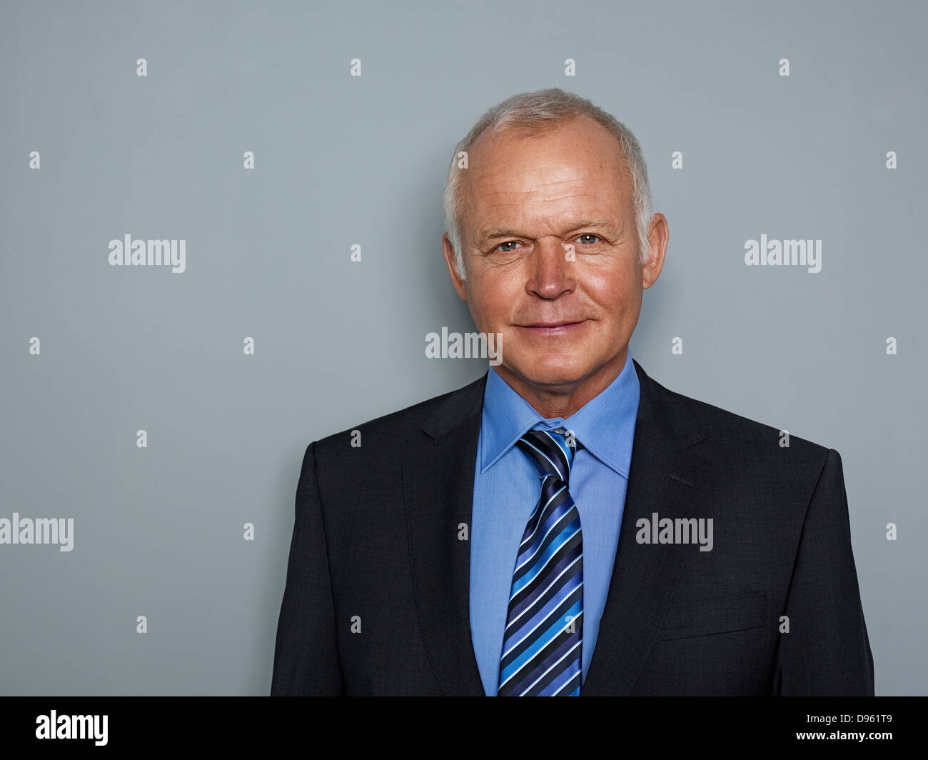 Portrait of businessman smiling Stock Photo - Alamy