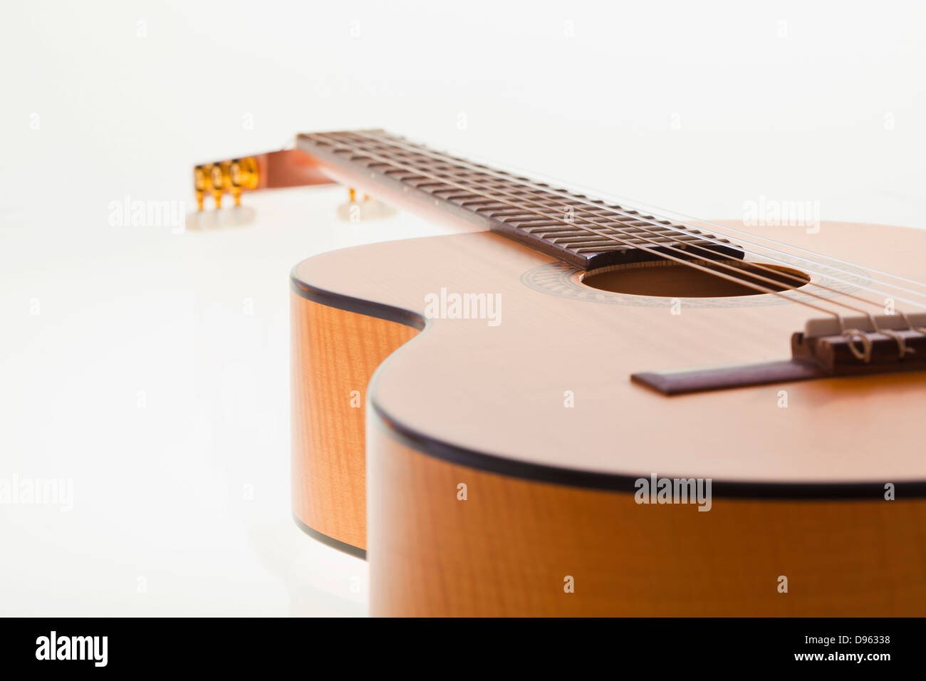 Acoustic guitar on white background, close up Stock Photo - Alamy