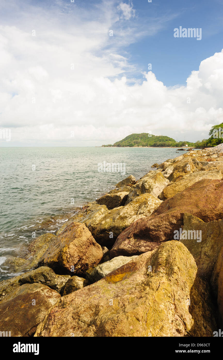 Stone wave barrier near seashore in Chanthaburi, Thailand Stock Photo ...