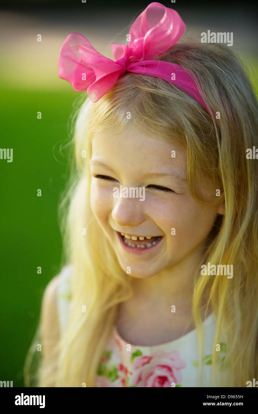 Pretty little girl smiling, portrait Stock Photo - Alamy